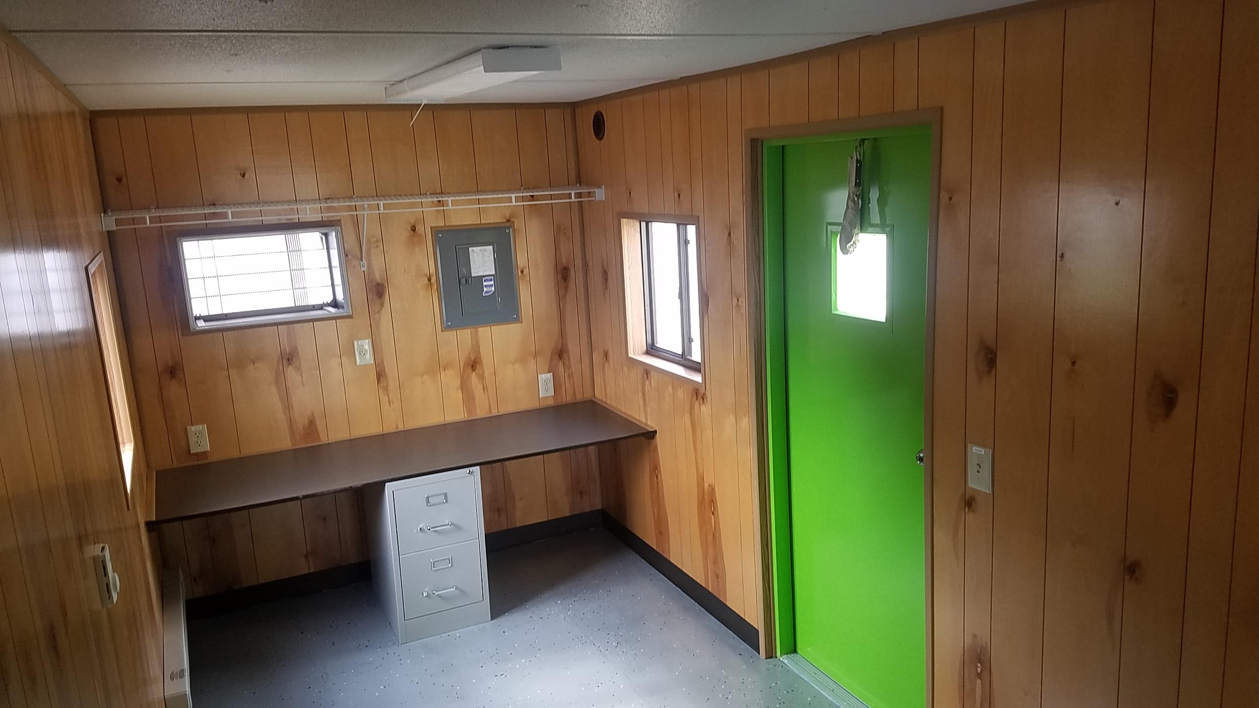 20' Office Container Ground Level Interior desk | Dear John Trailer Rentals